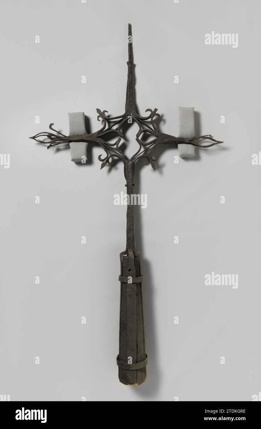 Tower cross whose intersection was forged into a window in which a ...