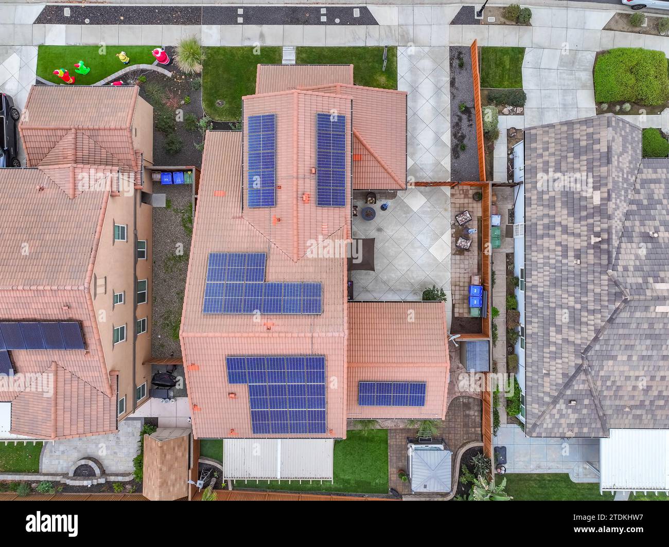Top Down Aerial View over a house with solar panels in California Stock ...