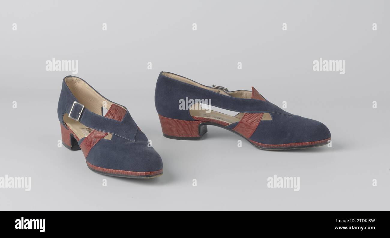 Shoe of dark blue suede, open model decorated with red crocodile ...