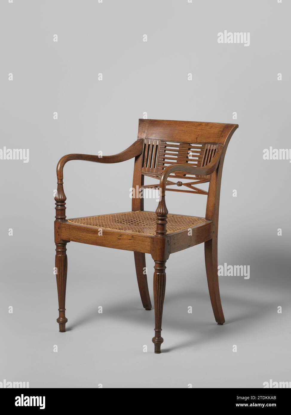 Arm chair of teak and rattan -stretched seat, so -called 'raffles ...