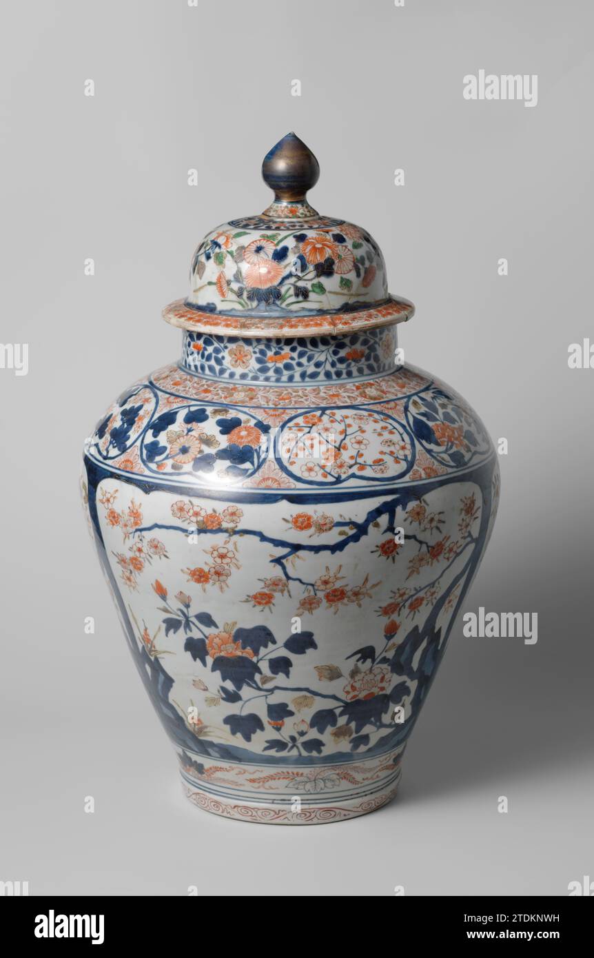 Covered jar with flowering plants in panels, flower sprays and scrolls ...