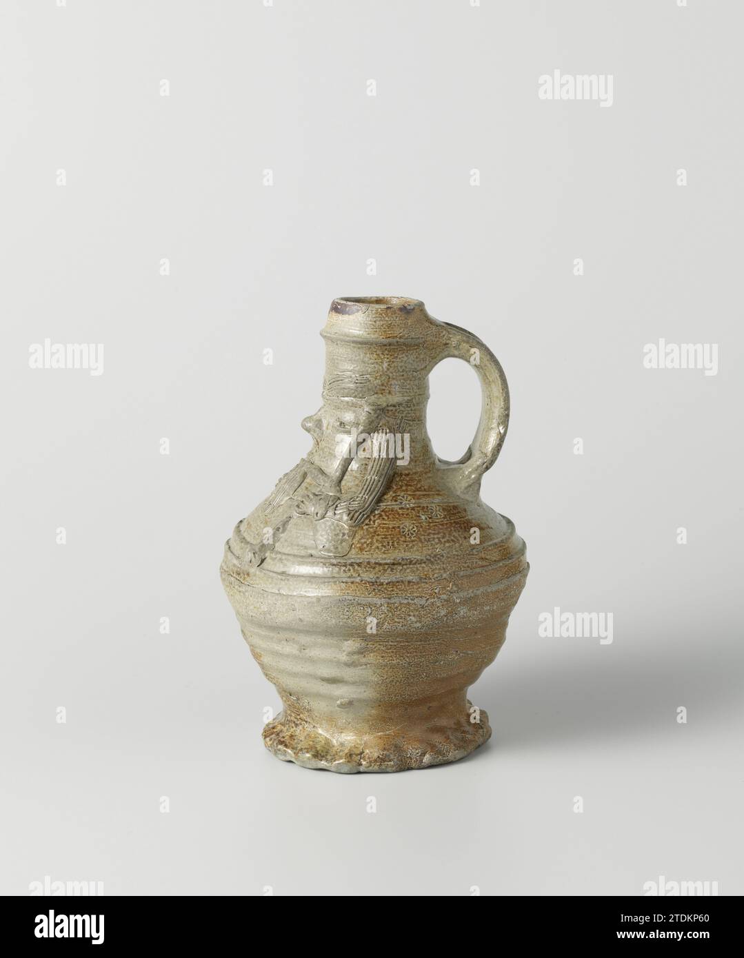 Jug with a face with a bagpipe player, anonymous, c. 1520 - c. 1550 Jug ...