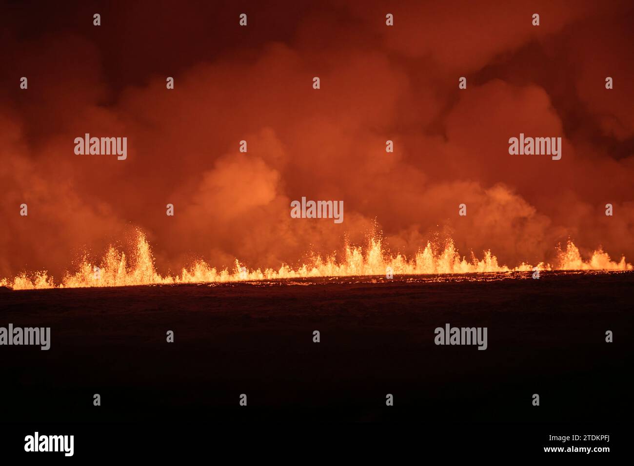 Lava fountains are seen as volcanic eruption started, turning the sky ...