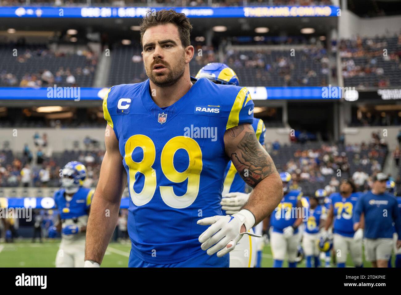 Los Angeles Rams tight end Tyler Higbee (89) jogs back to the locker ...