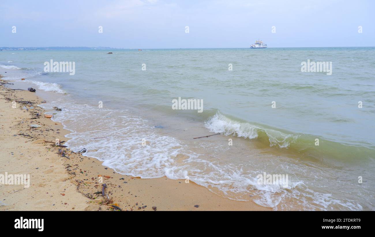Natural View Of Tidal Waves Crashing On The Shores Of Tanjung Kalian ...