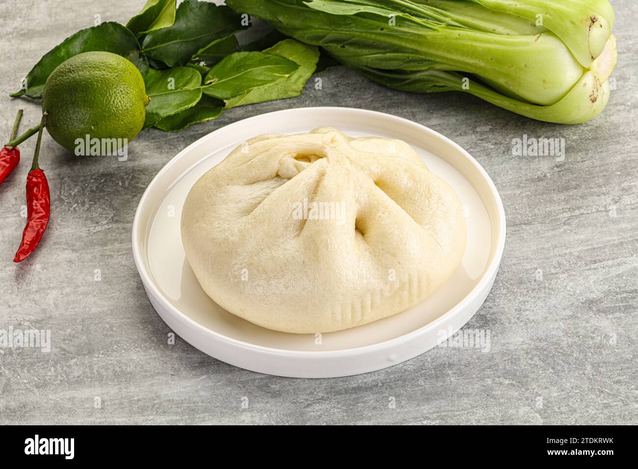 Chinese steamed bun Dim sum with meat Stock Photo - Alamy
