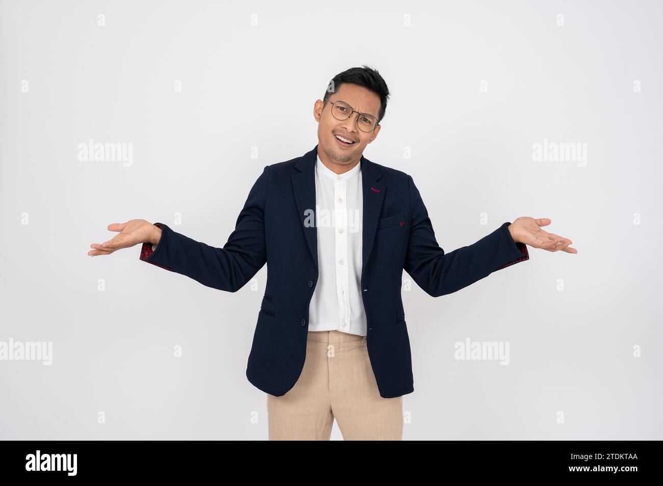 Businessman shrugging shoulders hi-res stock photography and images - Alamy