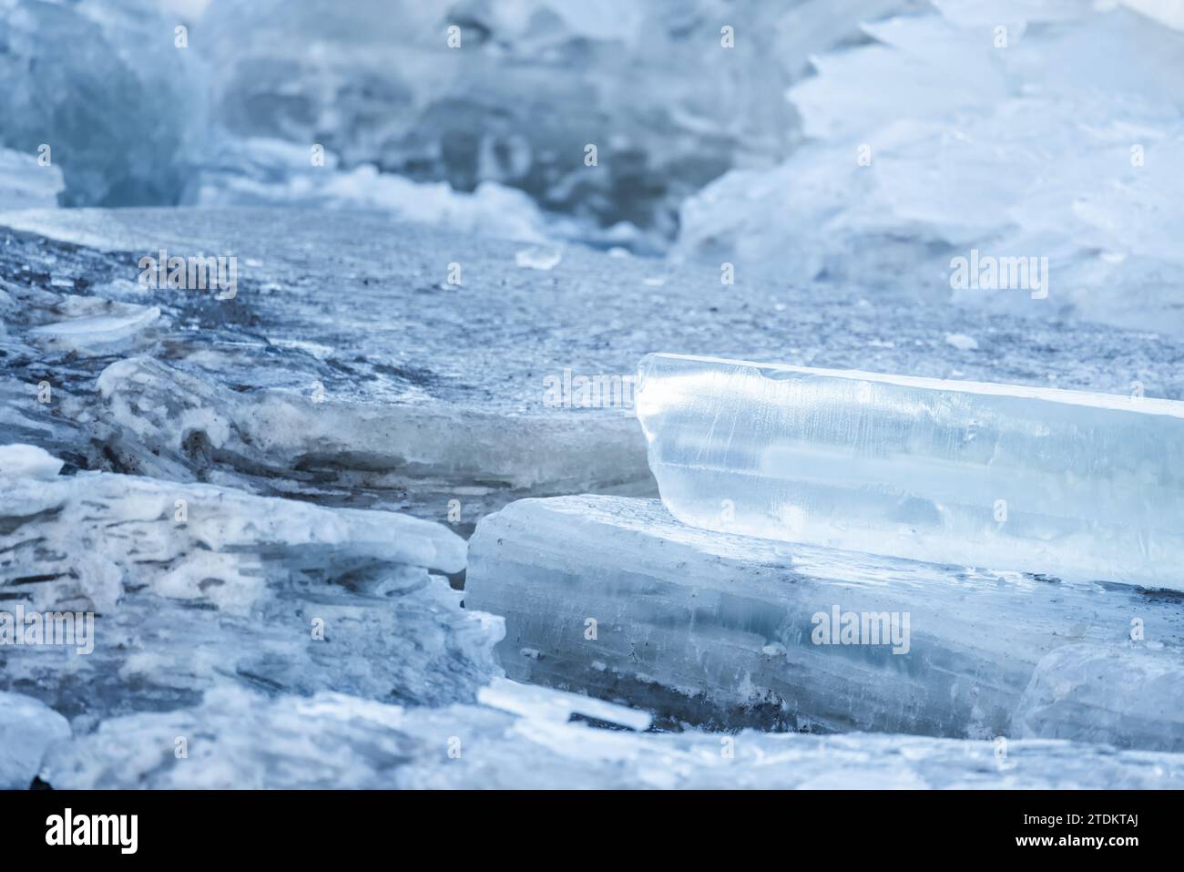 Ice floes lay on the coast of Baltic Sea on a daytime, natural winter ...
