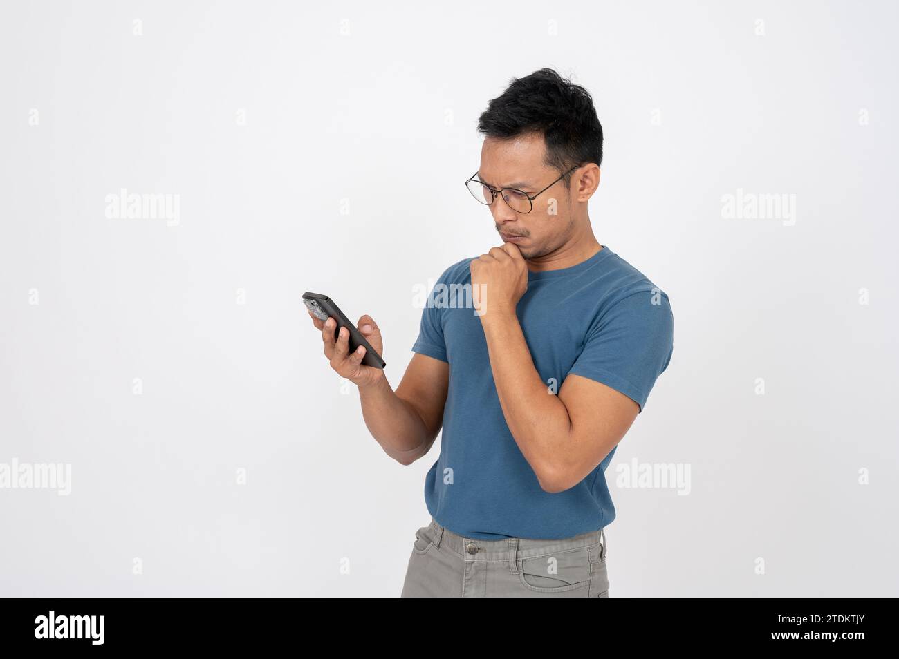 Doubtful face hi-res stock photography and images - Alamy