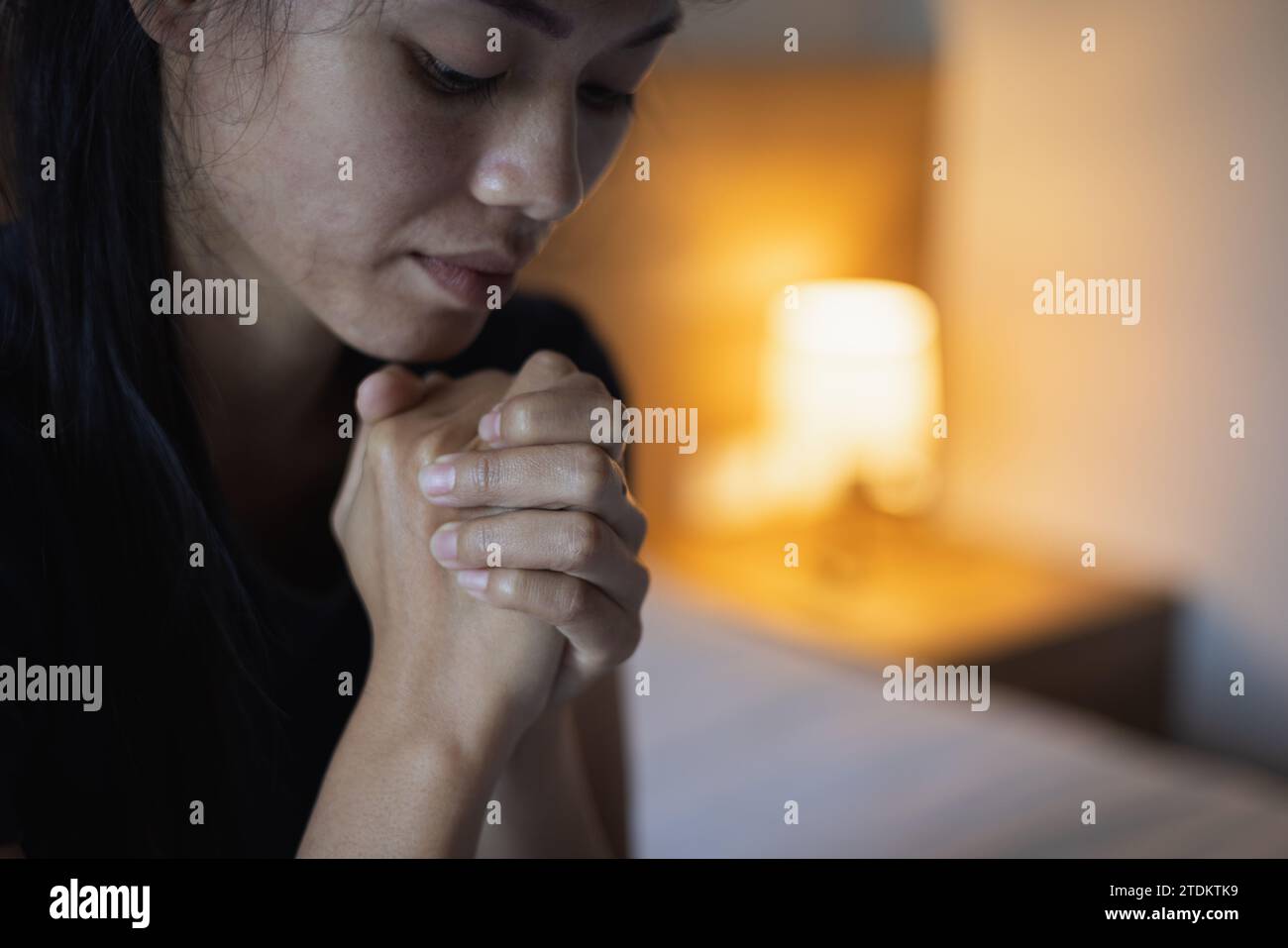Christian woman praying in bedroom, woman hands praying to god, begging for forgiveness and ...
