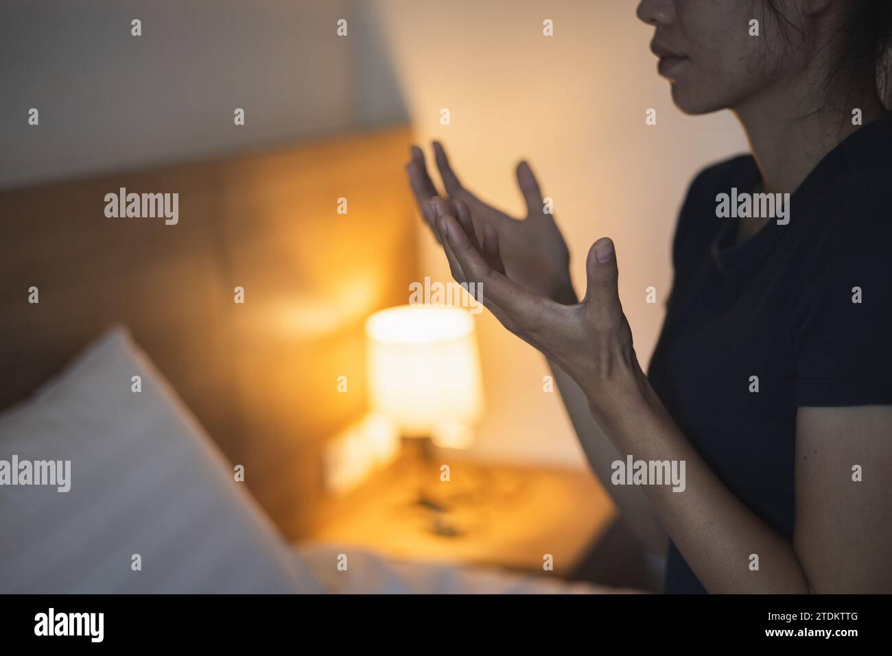 Christian woman praying in bedroom, woman hands praying to god, begging for forgiveness and ...