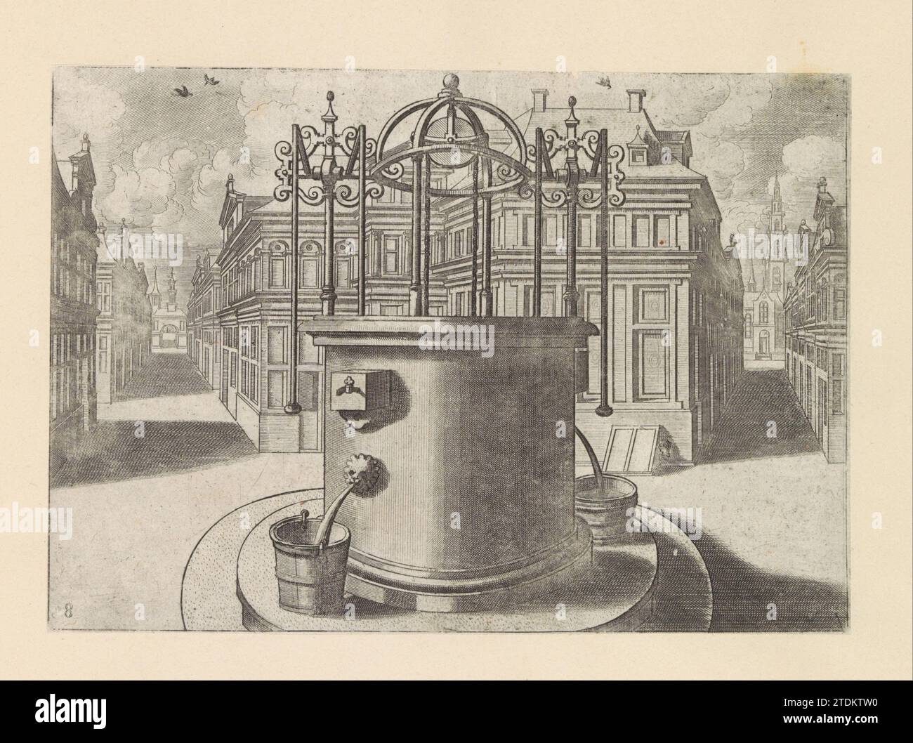 High round water well with iron ornamental overhuiving and two pump ...