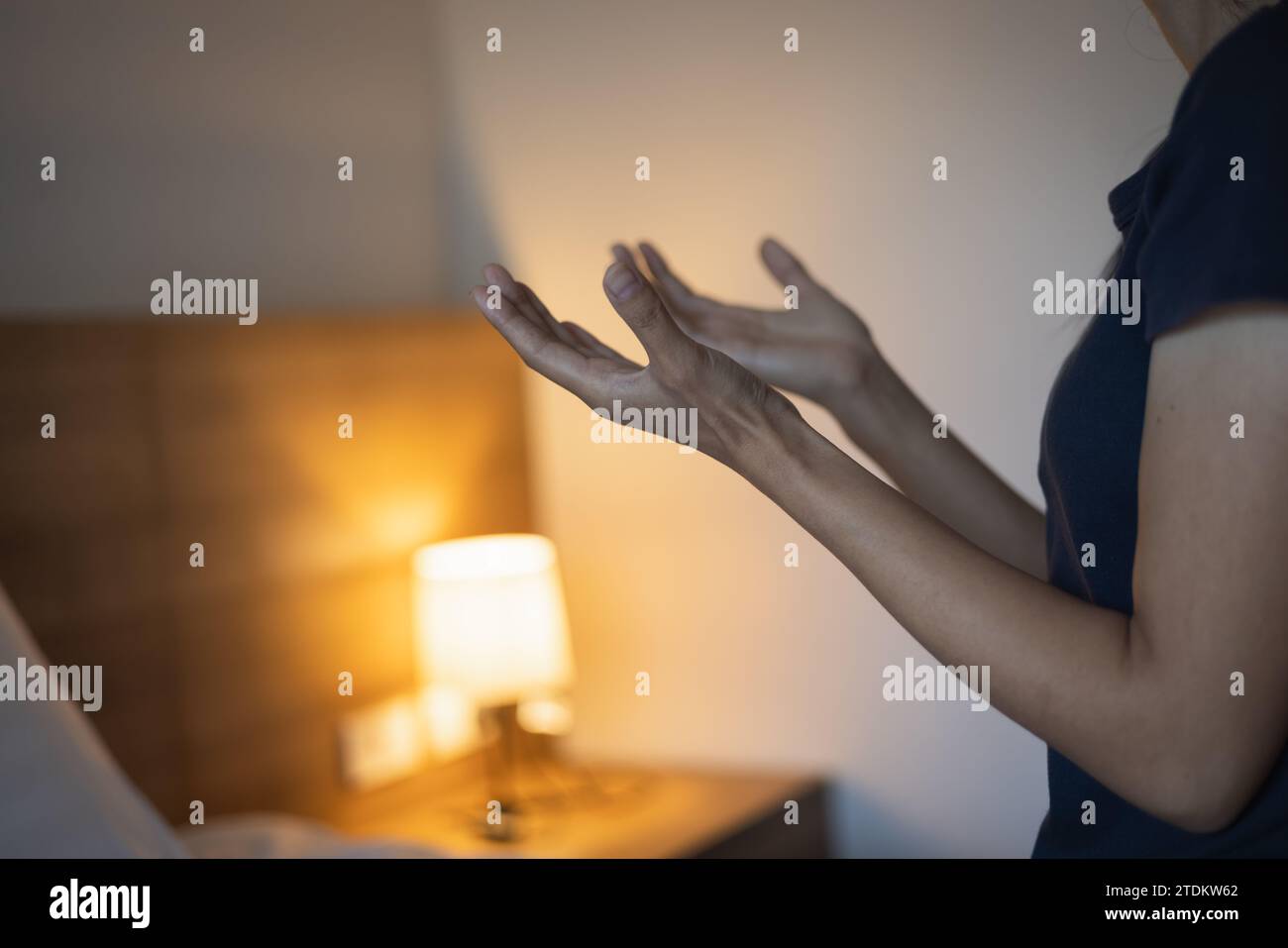 Christian woman praying in bedroom, woman hands praying to god, begging for forgiveness and ...