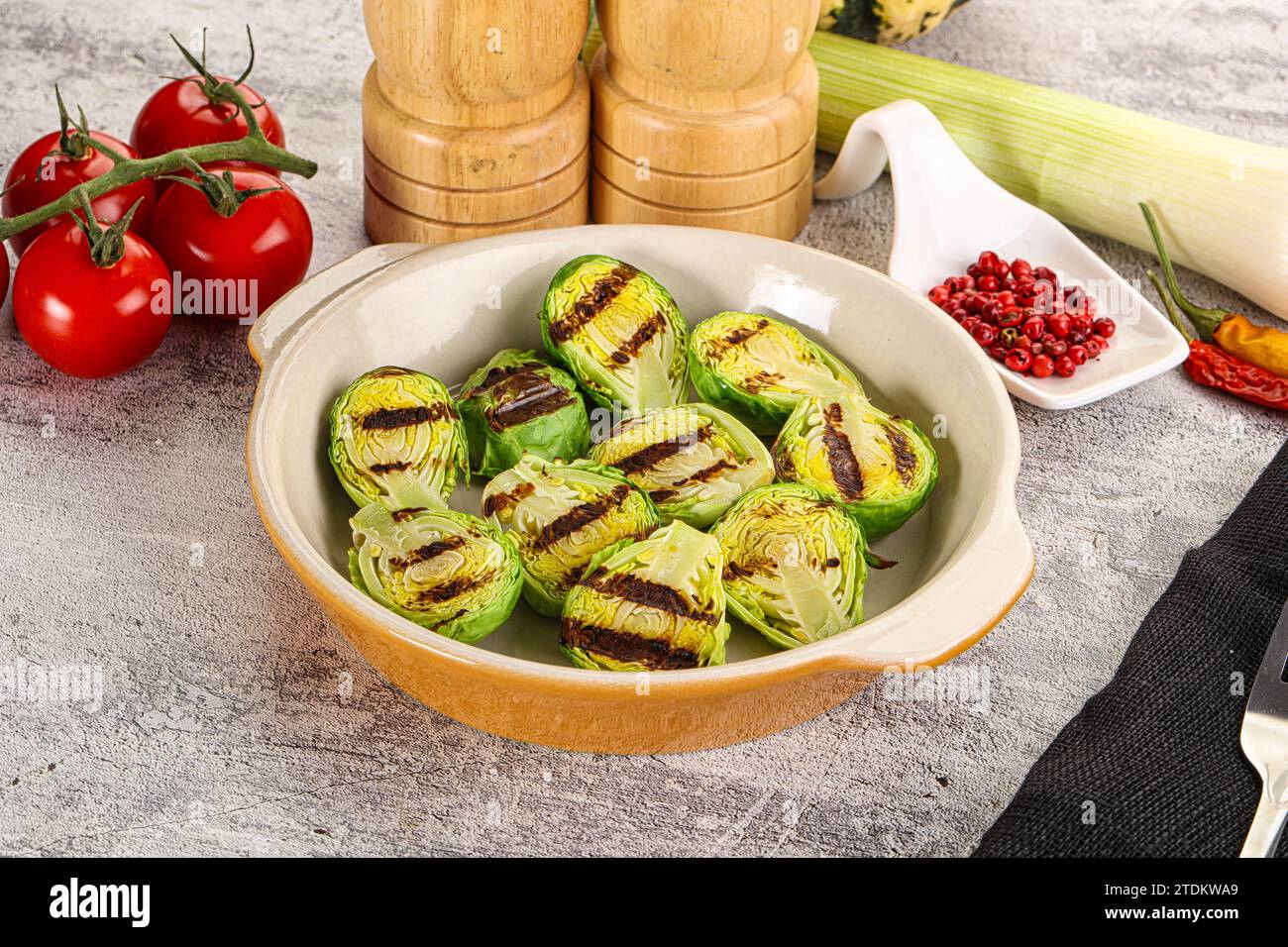 Vegan cuisine Grilled green brussel sprout cabbage Stock Photo - Alamy