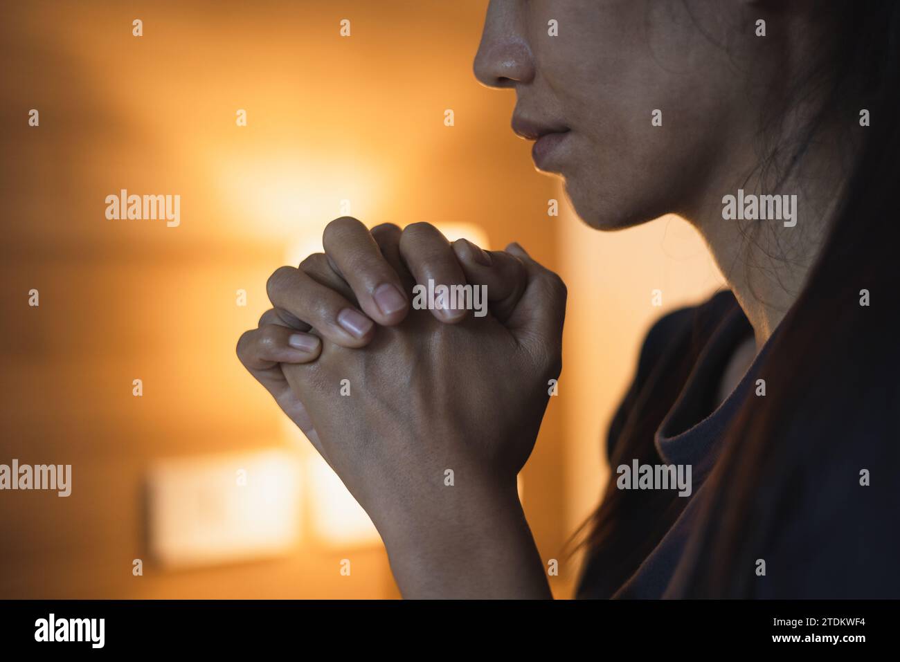 Christian woman praying in bedroom, woman hands praying to god, begging for forgiveness and ...