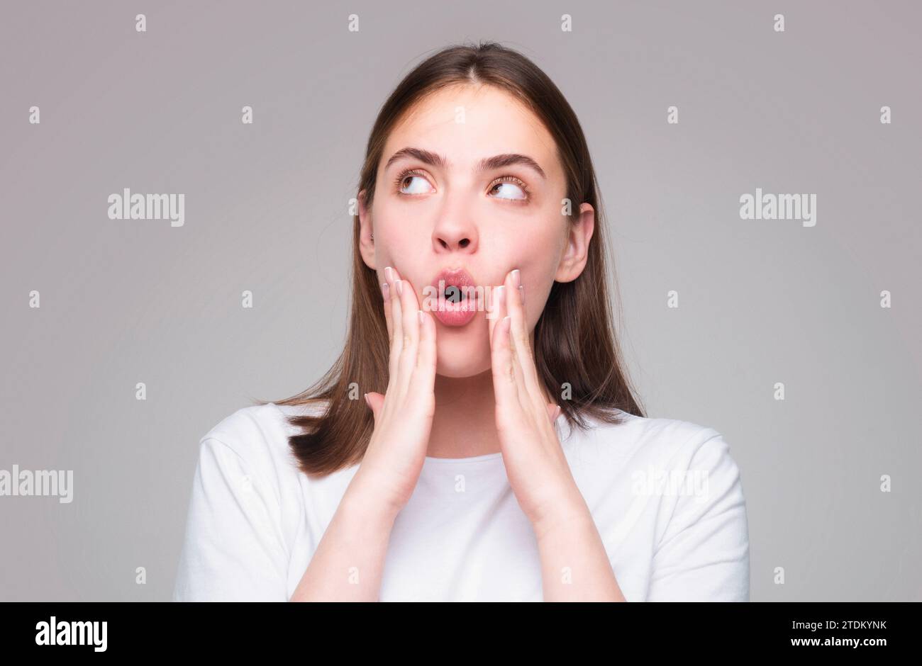 Shocked face of surprised young woman. Funny female shocked face ...