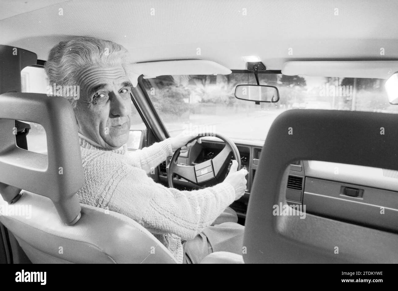 Car driver looking over right shoulder, 10-04-1990, Whizgle News from ...