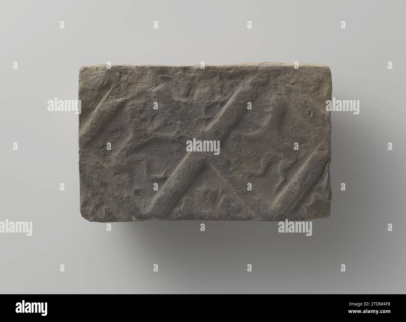 Hearing stone with representation of two climbing lions, placed in two ...