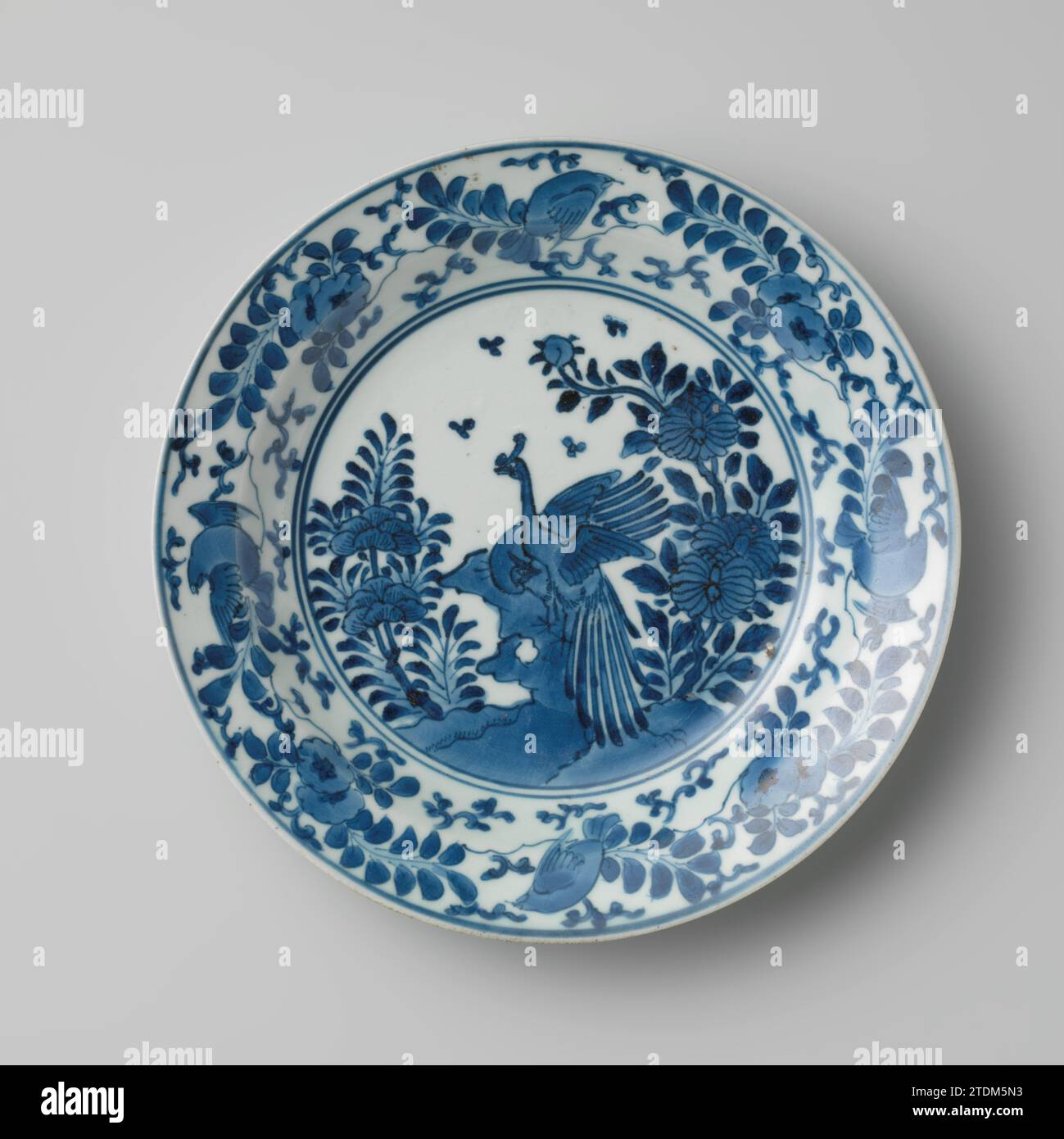 Plate with two hoo-birds on a rock and floral scrolls, anonymous, c. 1600 - c. 1699 Plate of ...