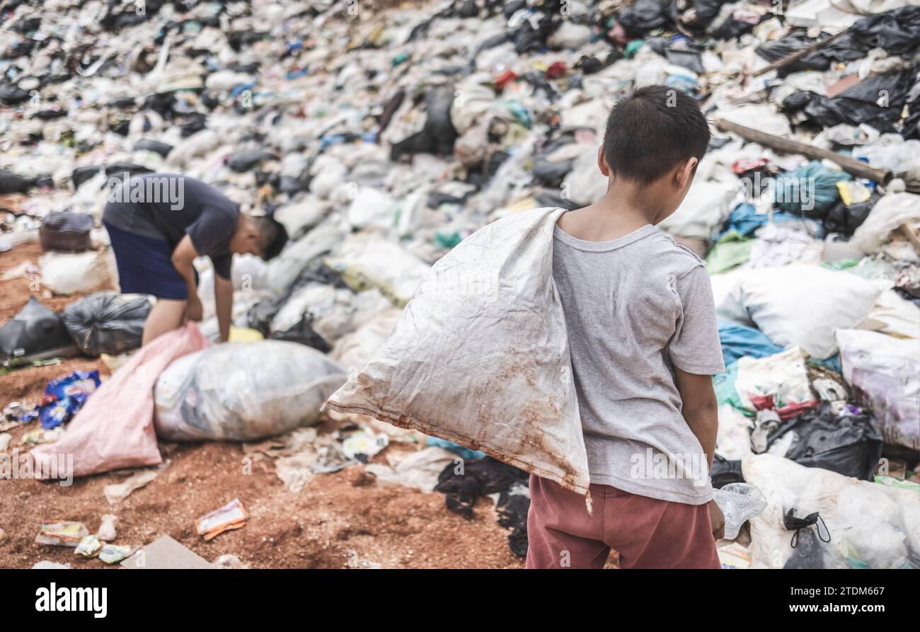 Poor children collect garbage for sale because of poverty, Junk recycle ...