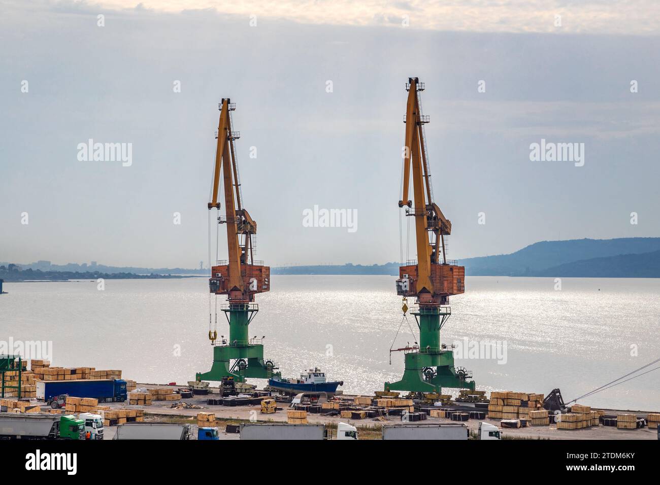 Two giant Port cranes are ready to load grain from cargo ships ...