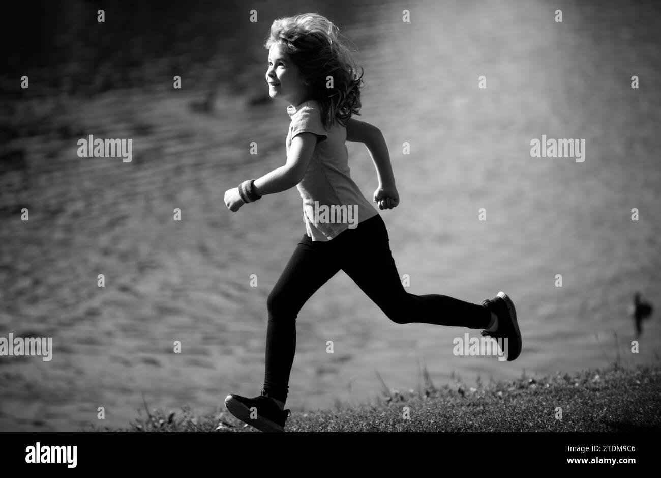 Kids sprinting Black and White Stock Photos & Images - Alamy