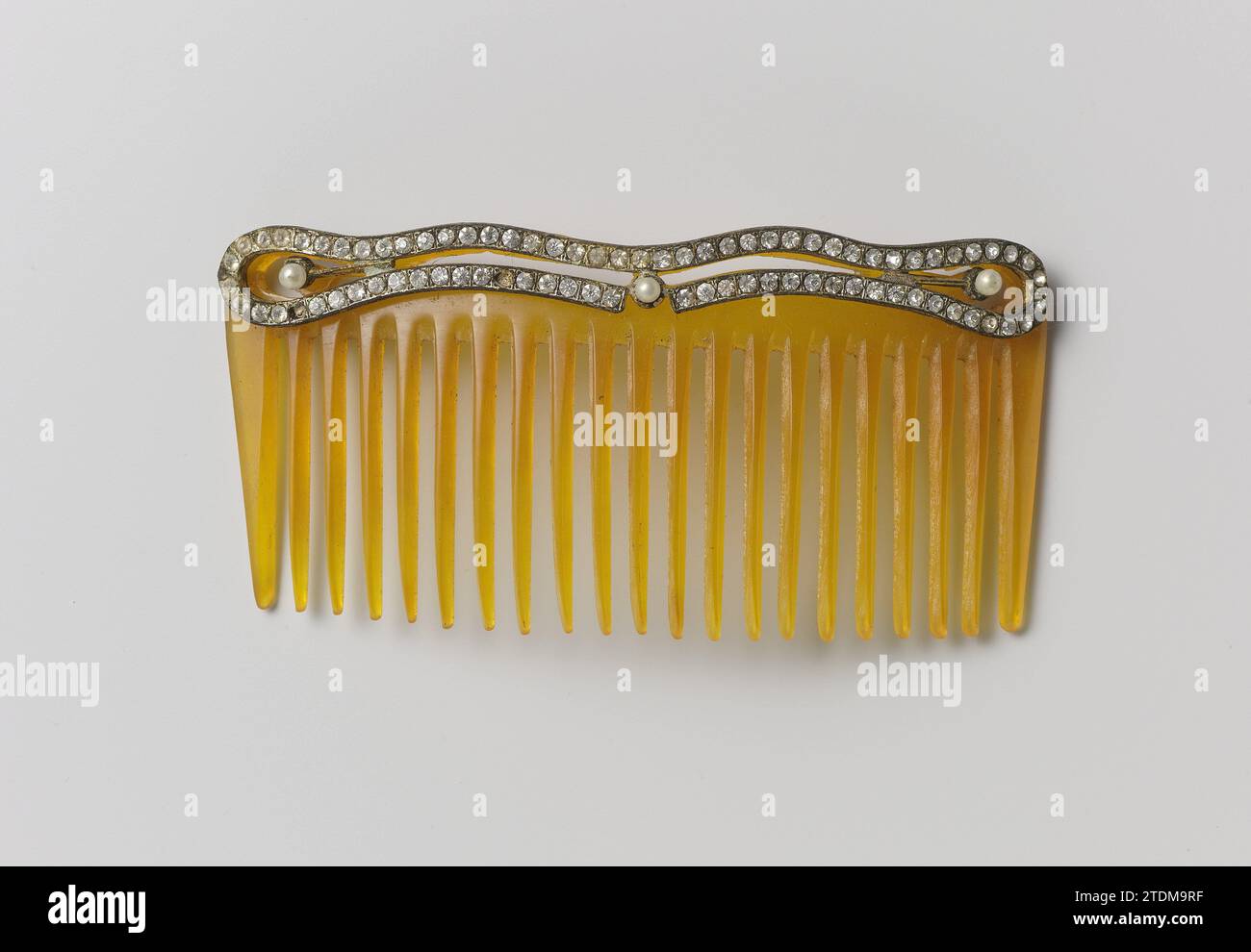 Plastic hair comb, with back on which pearls and stras, c. 1875 - c ...