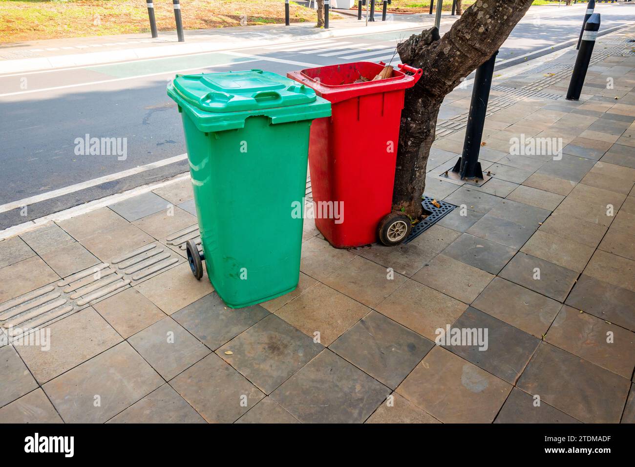 Trash bins on green grass hi-res stock photography and images - Alamy