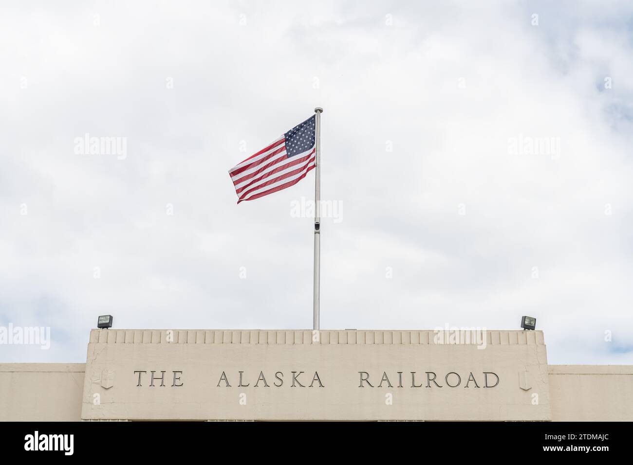 Anchorage Railway depot sign with a Stars and Stripes flag, Anchorage ...