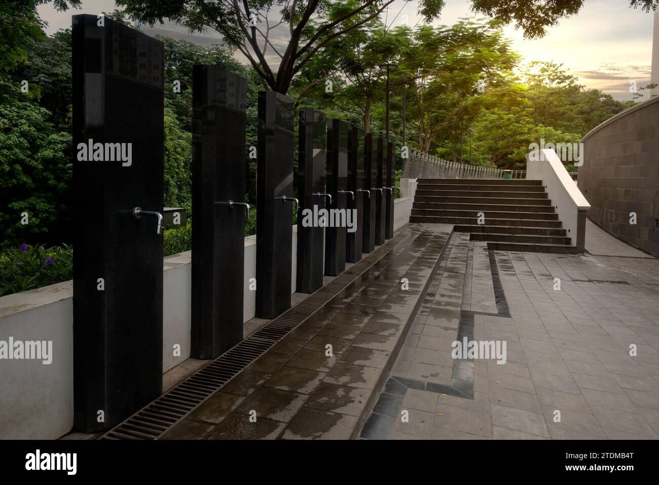 A row of water tap ablution places for Muslims before entrance or ...