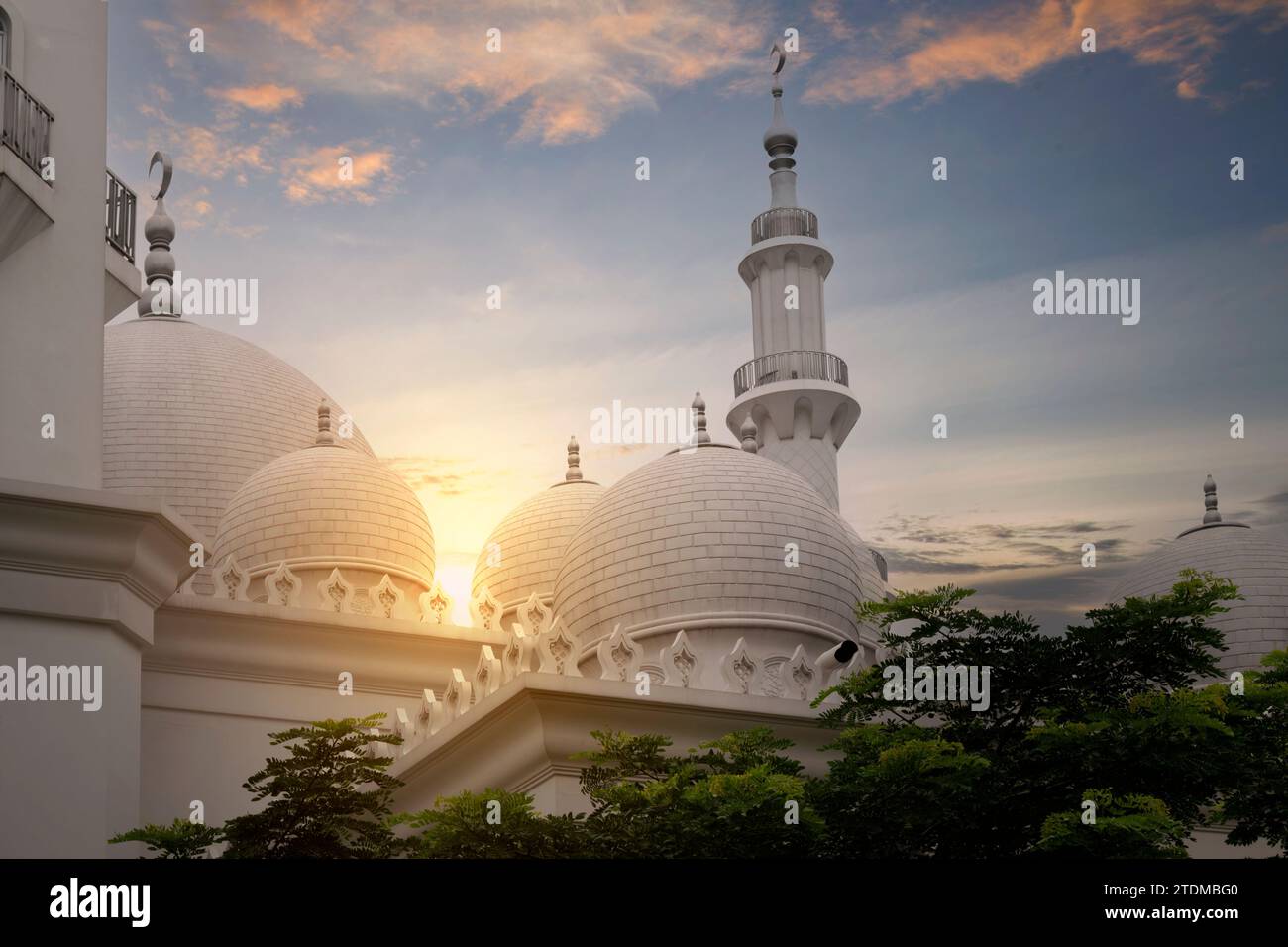 The dome and minaret of the mosque with sunset scene background Stock ...