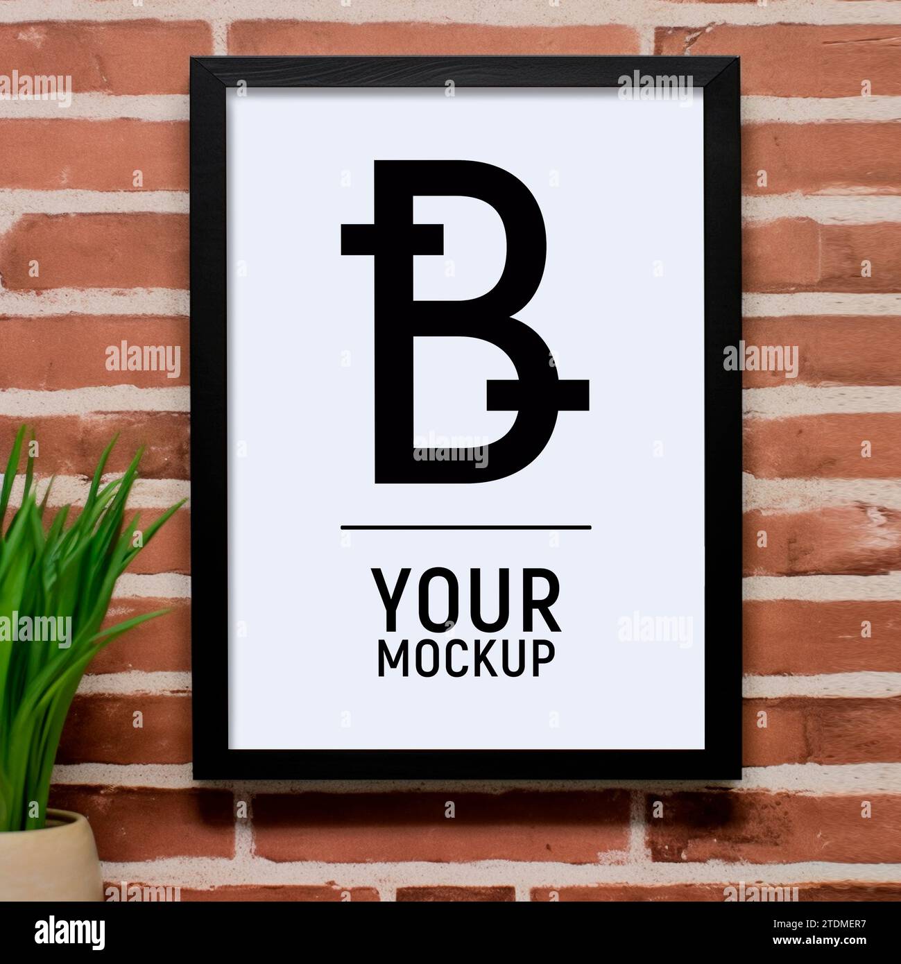Mockup photo frame in vertical format on a table on a red brick ...