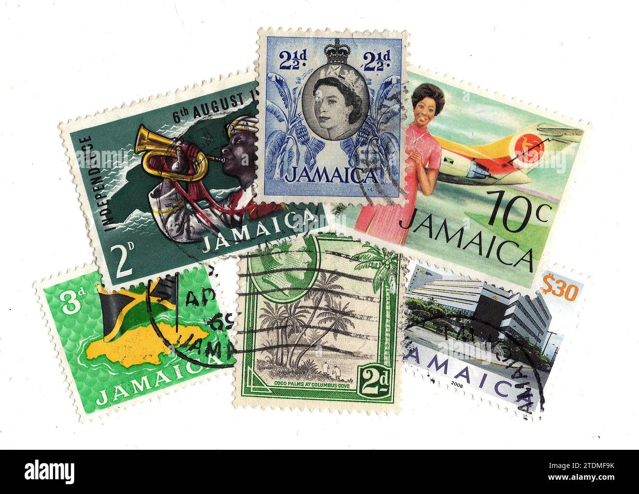 A montage of vintage postage stamps from Jamaica on a white background ...