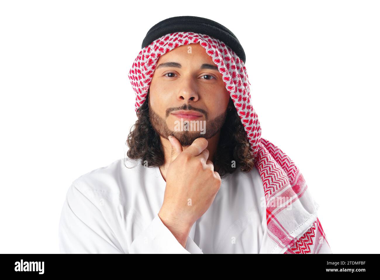 Pensive young man in traditional middle-east dress thobe on white ...