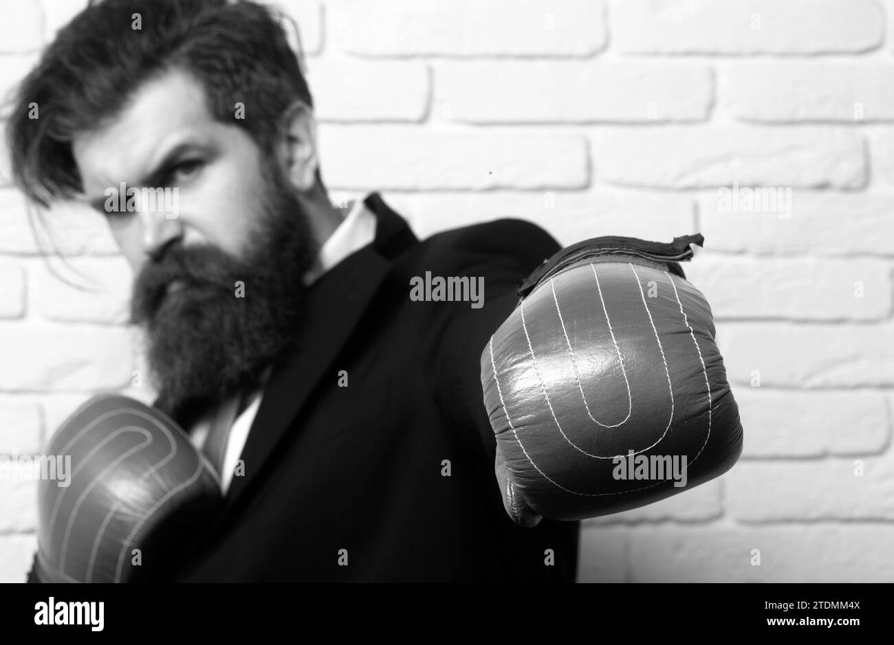 Crazy man boxing. Hard business. Businessman wearing suit standing in ...