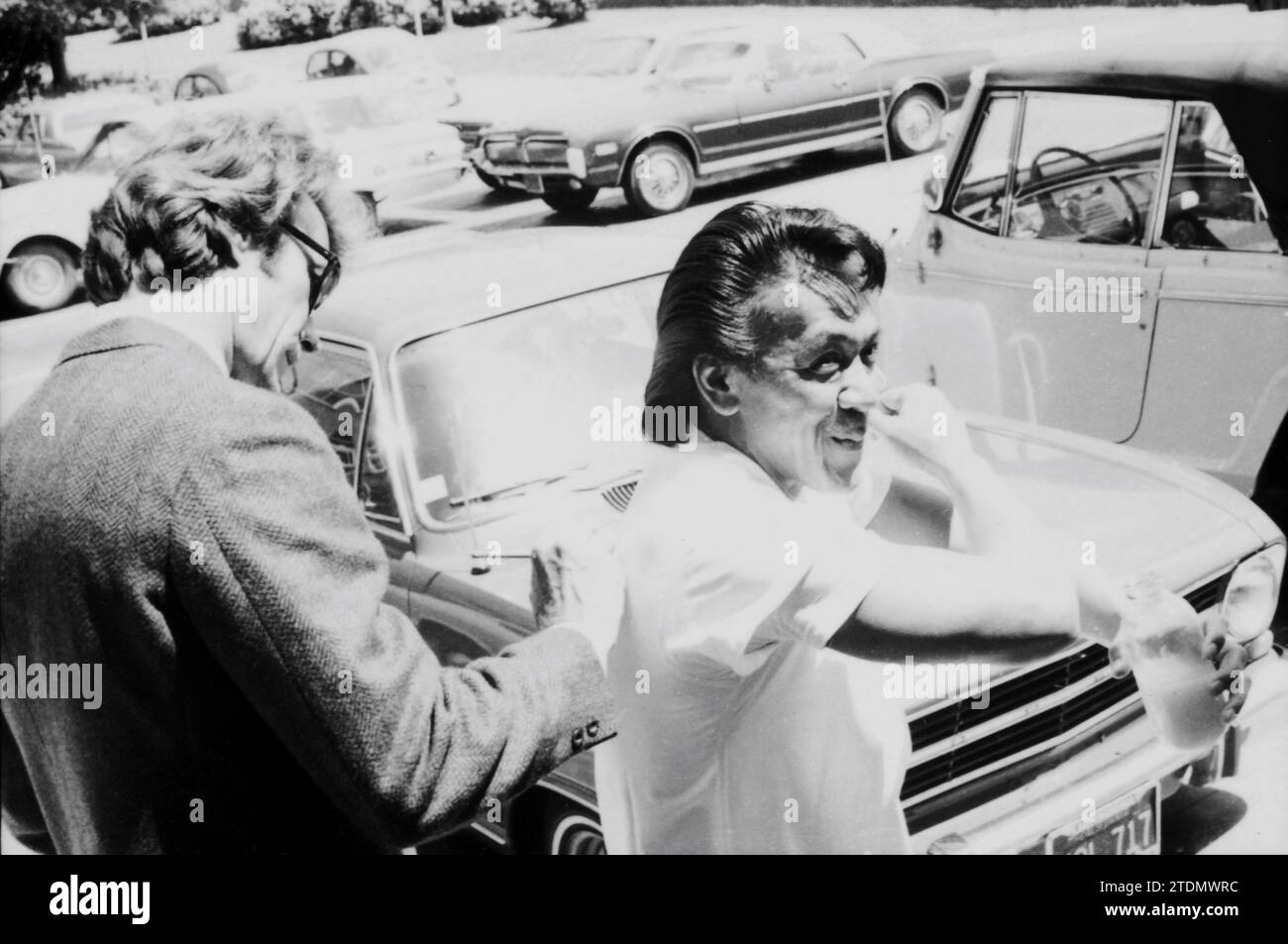 CLINT EASTWOOD giving his autograph to a fan on set location candid ...