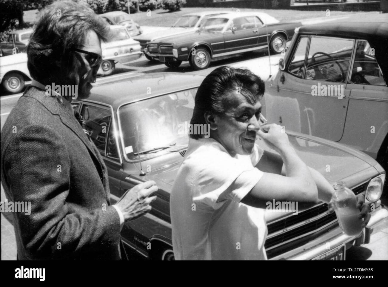 CLINT EASTWOOD giving his autograph to a fan on set location candid ...