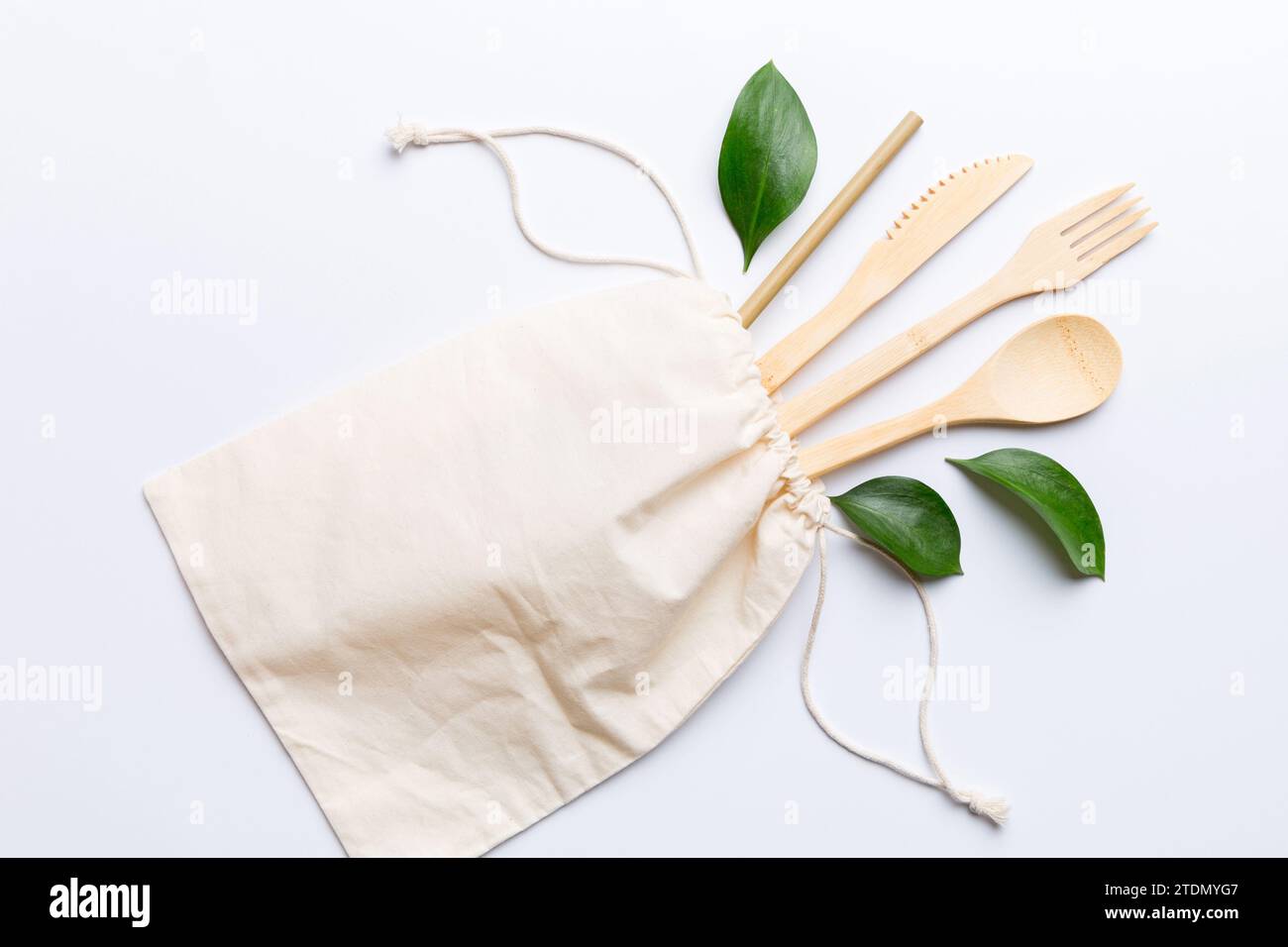 Eco friendly reusable recyclable white eco bag with kitchenware on ...