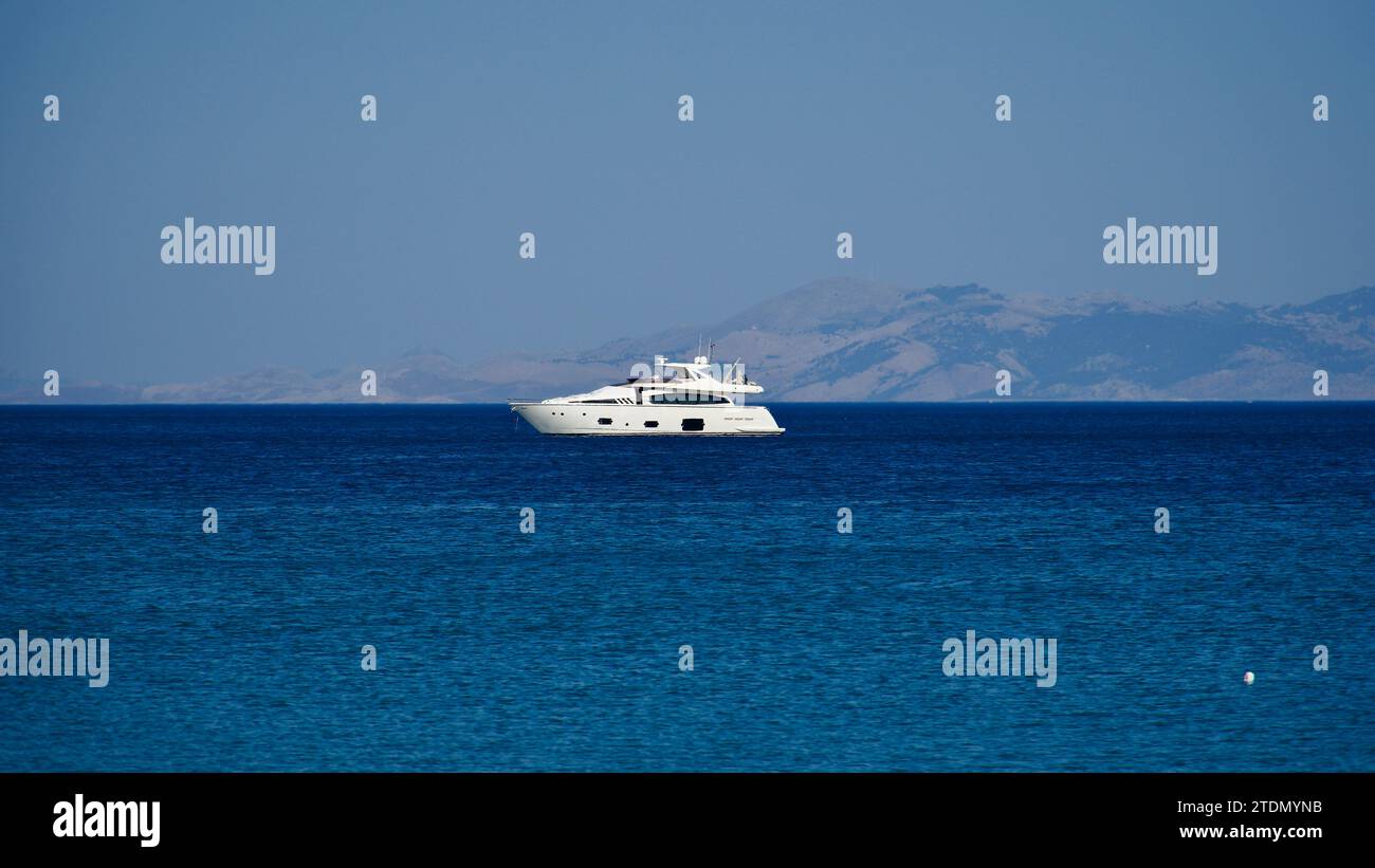 Luxury moto boats on blue sky and dark blue sea. Sailing and motor ...