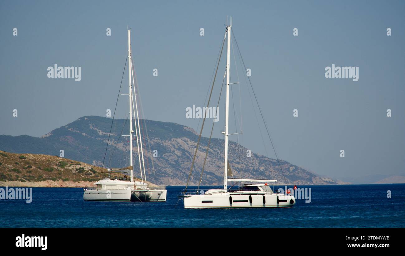 Luxury moto boats on blue sky and dark blue sea. Sailing and motor ...