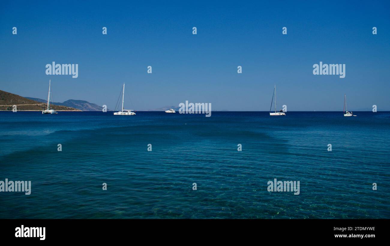 Luxury moto boats on blue sky and dark blue sea. Sailing and motor ...