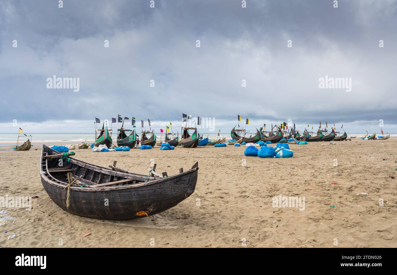 Moody landscape view of traditional wooden fishing boats known as moon ...
