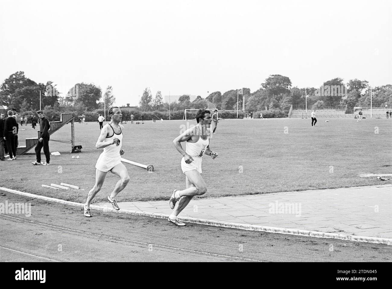 Running on athletics track, 00-06-1965, Whizgle News from the Past ...