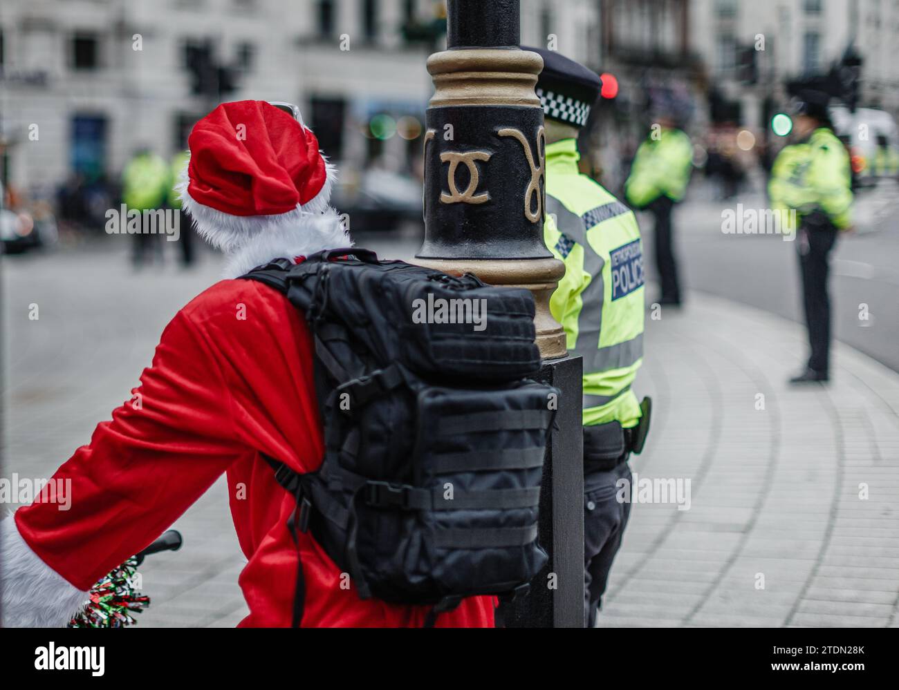 Santa lines up alongside the met police in central London Stock Photo ...