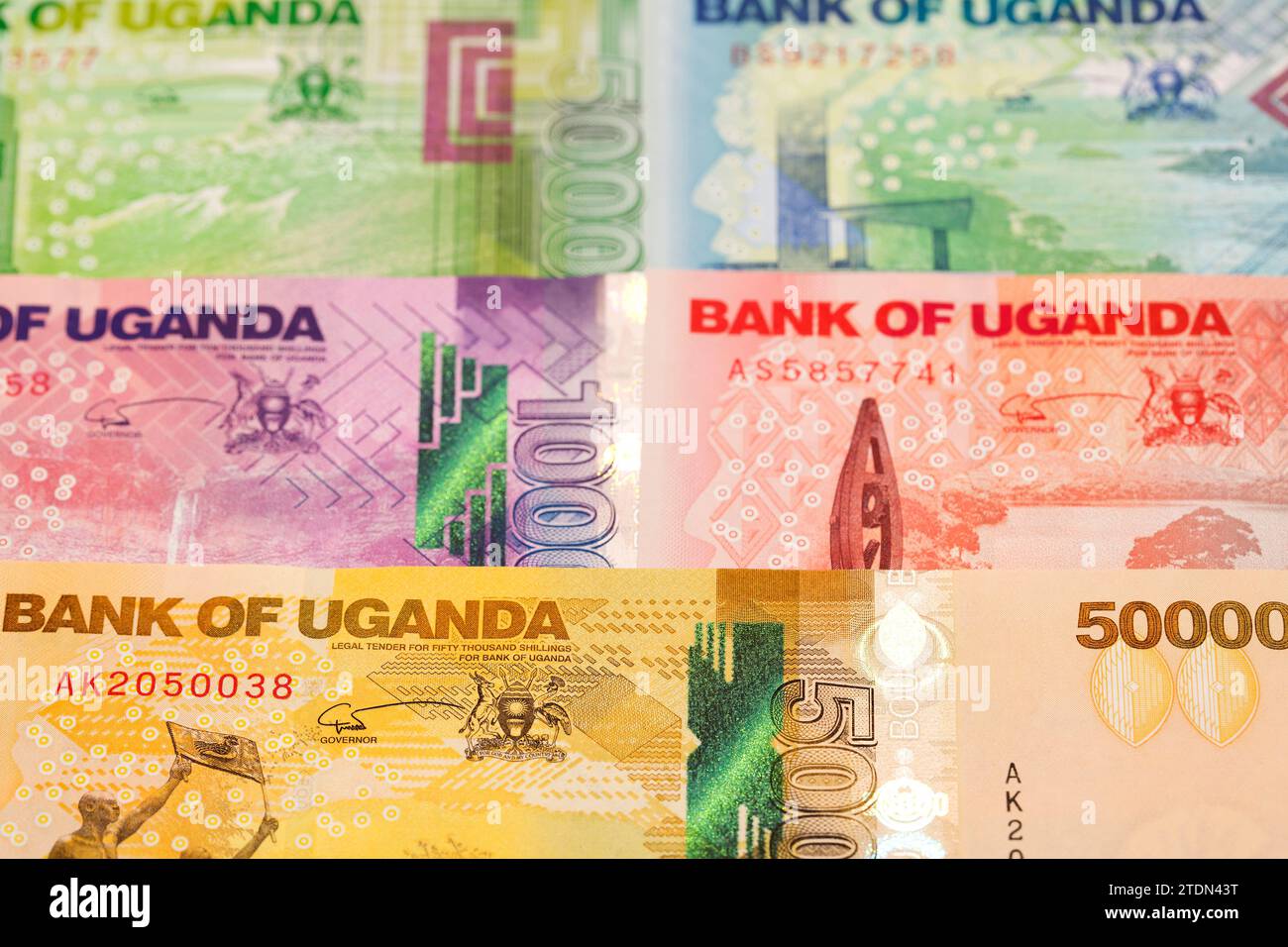 Ugandan money - shilling a business background Stock Photo - Alamy