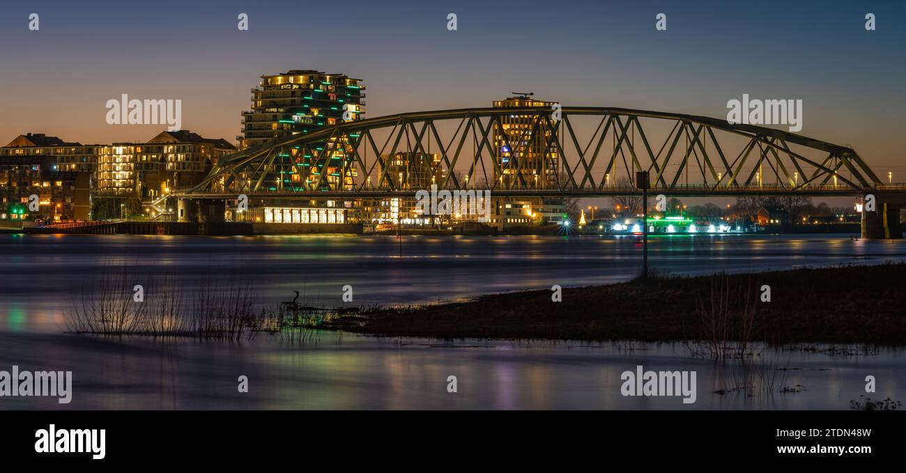 Cityscape of Nijmegen at night, view of the Snelbinder bridge and the ...