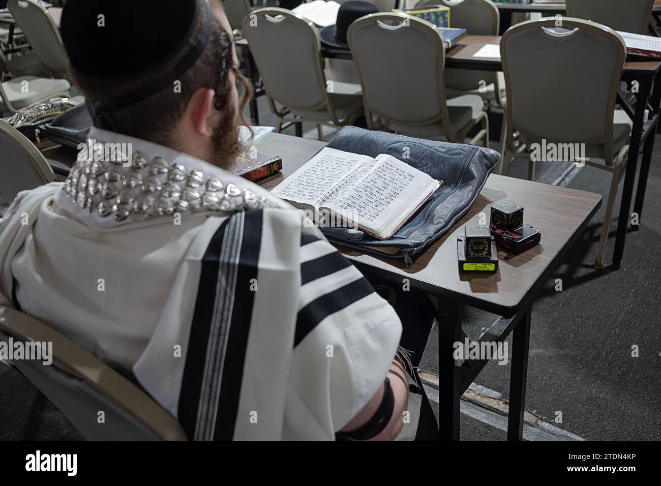A generic photo of an orthodox Jewish man at morning prayers. In a ...