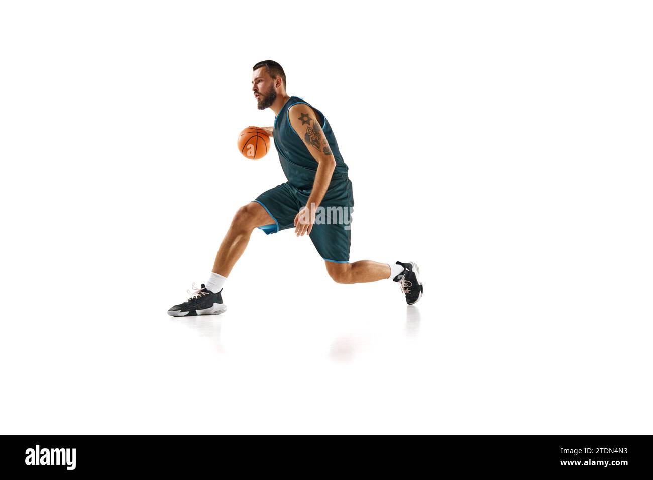Basketball player, athletic man workout in motion, highlighting ...