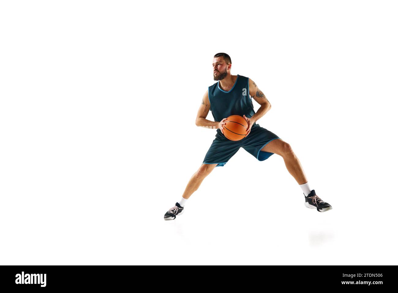 Full length portrait of athletic man, professional basketball player ...