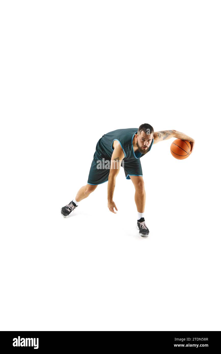 Skill and athleticism. Portrait of basketball player executing perfect ...